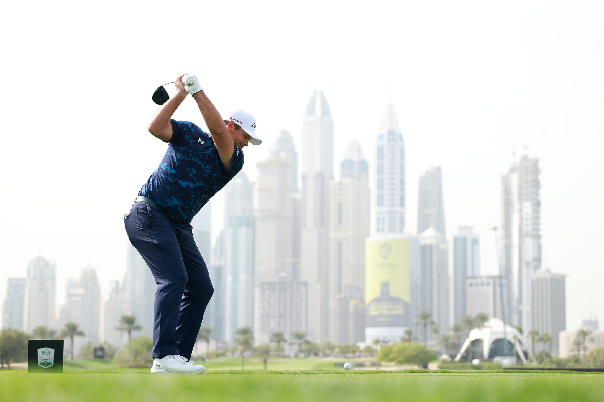 Reed Charges to Commanding Lead After Moving Day 67 in Dubai - TheGolfHouse